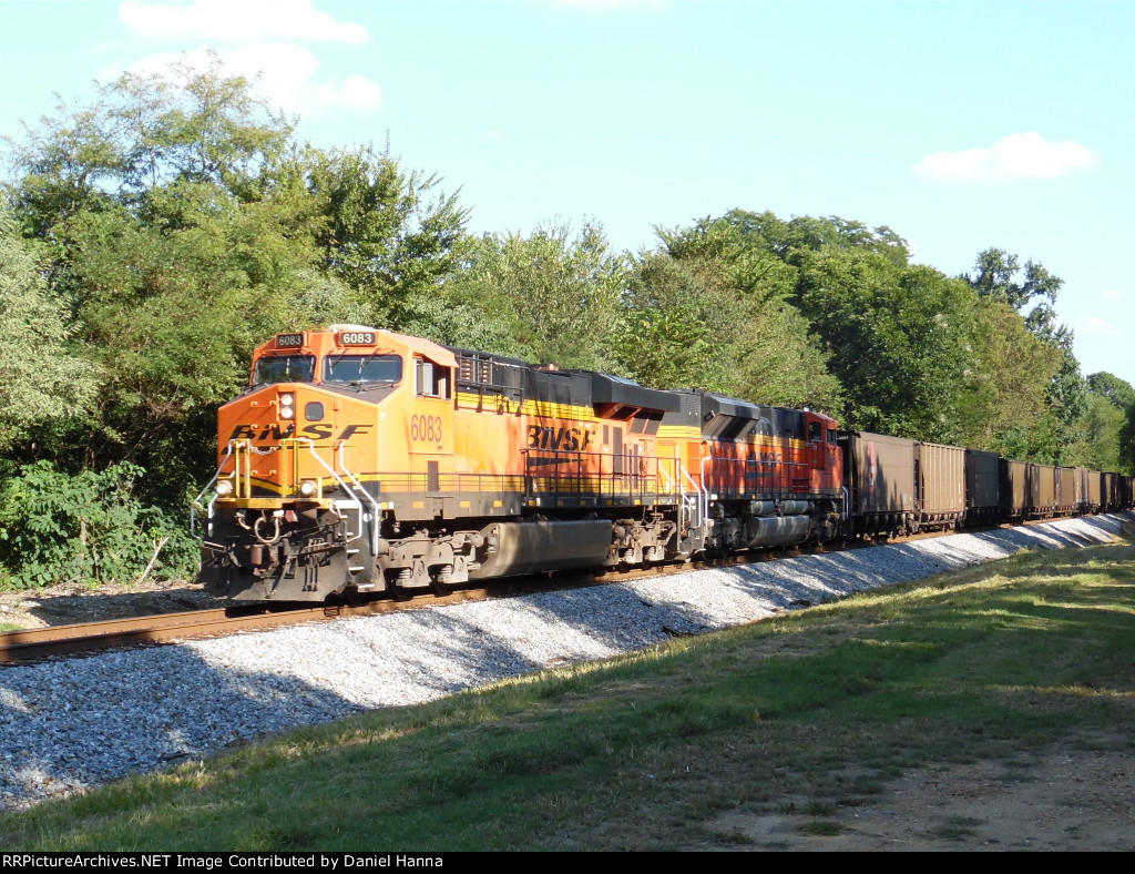 BNSF 6083 leads 735 west